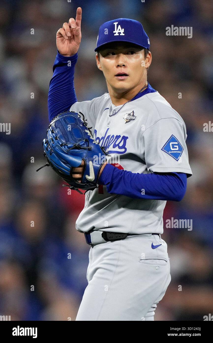Los Angeles Dodgers pitcher Yoshinobu Yamamoto celebrates the end of ...