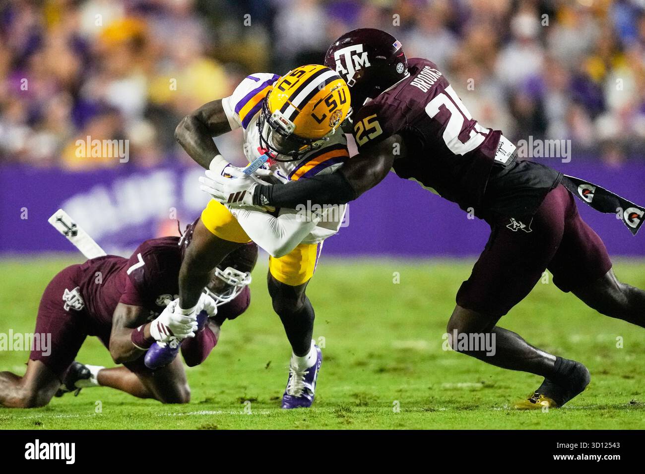 LSU wide receiver Aaron Anderson (1) carries between Texas A&M ...