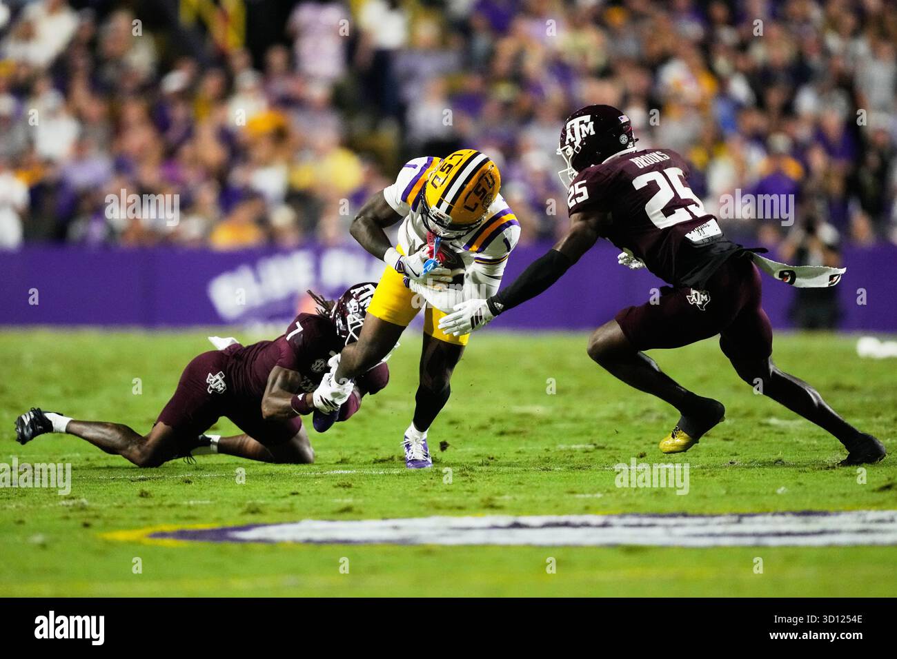 LSU wide receiver Aaron Anderson (1) carries between Texas A&M ...
