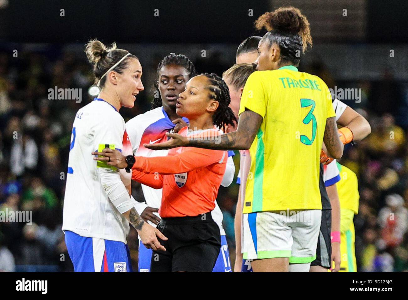 Lucy Bronze (12 England) talking to referee Natalie Simon during the ...