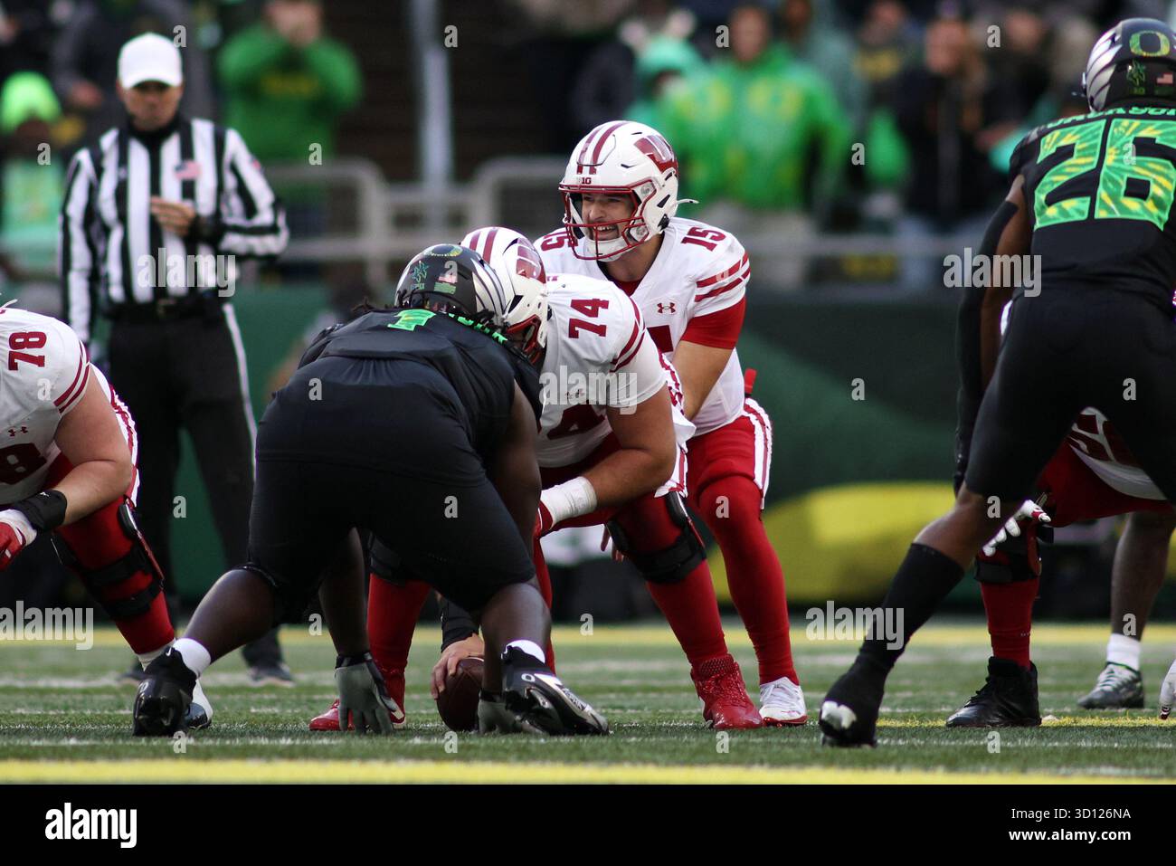 Wisconsin quarterback Hunter Simmons (15) scans for an opening in the ...