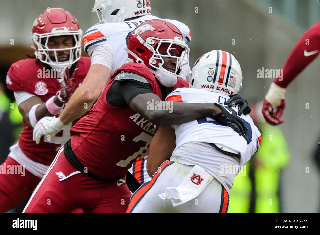 October 25, 2025: Arkansas line backer Bradley Shaw (7) wraps up Auburn ...