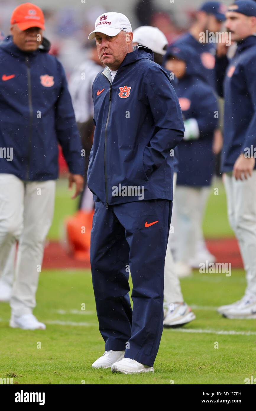 October 25, 2025: Auburn Head Coach Hugh Freeze looks out over his team ...