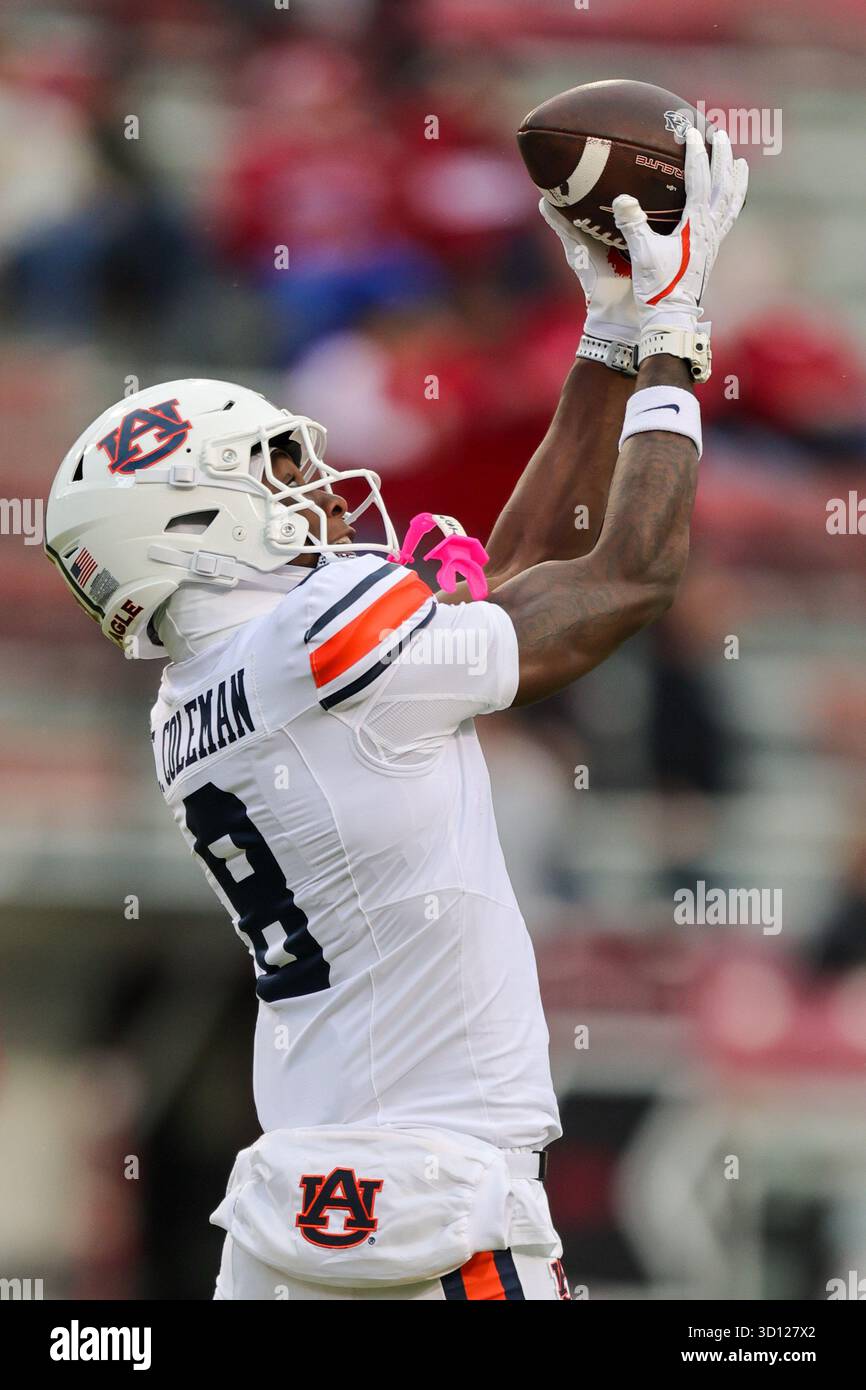 October 25, 2025: Cam Coleman (8) wide receiver for Auburn clasp a ball ...