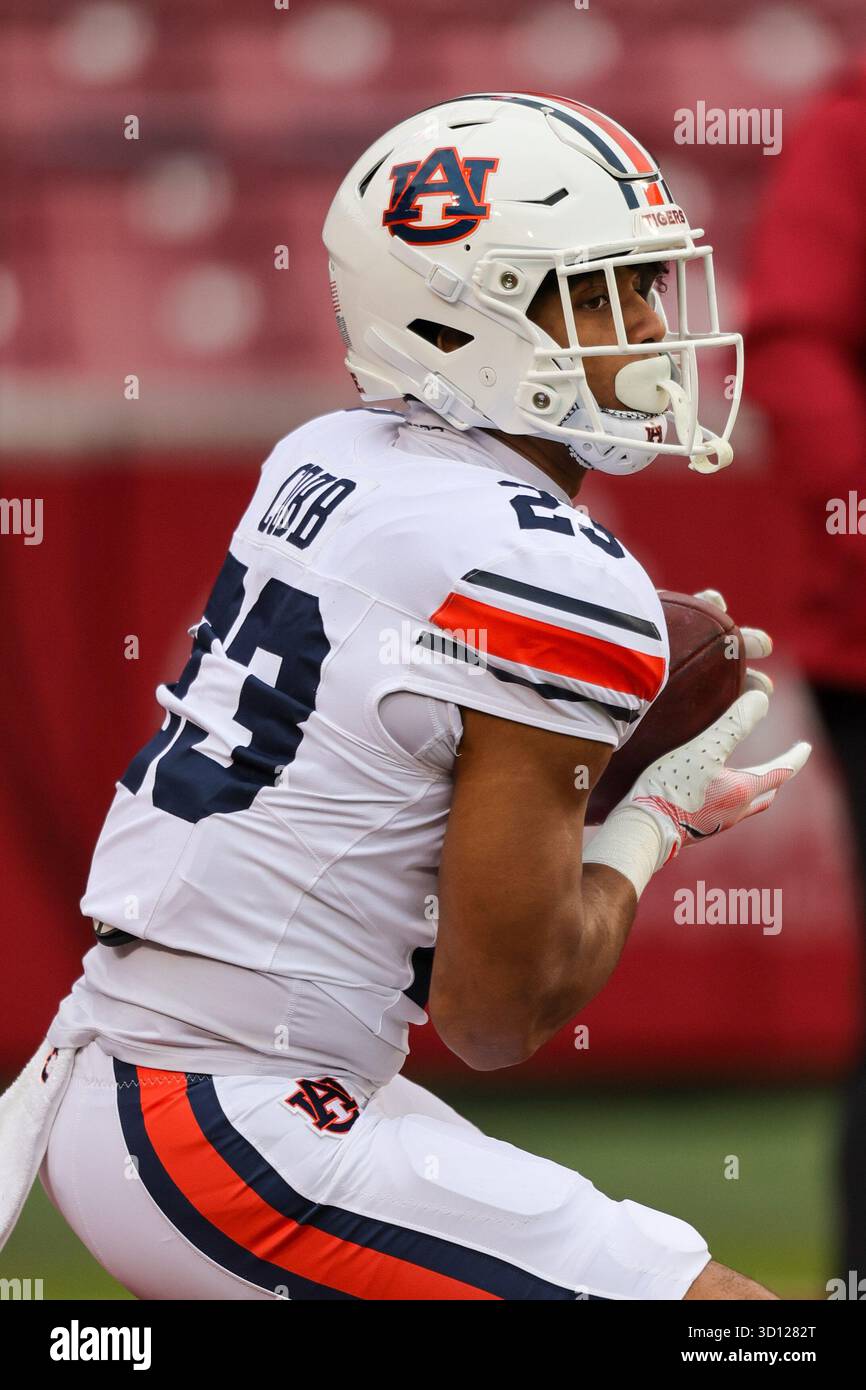 October 25, 2025: Auburn return man Jeremiah Cobb (23) secures a ball ...