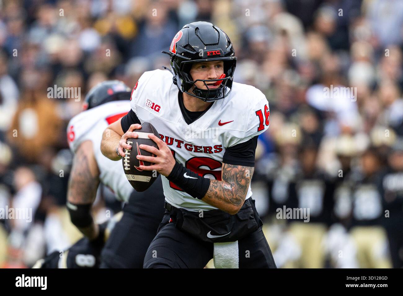 October 25, 2025: Rutgers quarterback Athan Kaliakmanis (16) scrambles ...