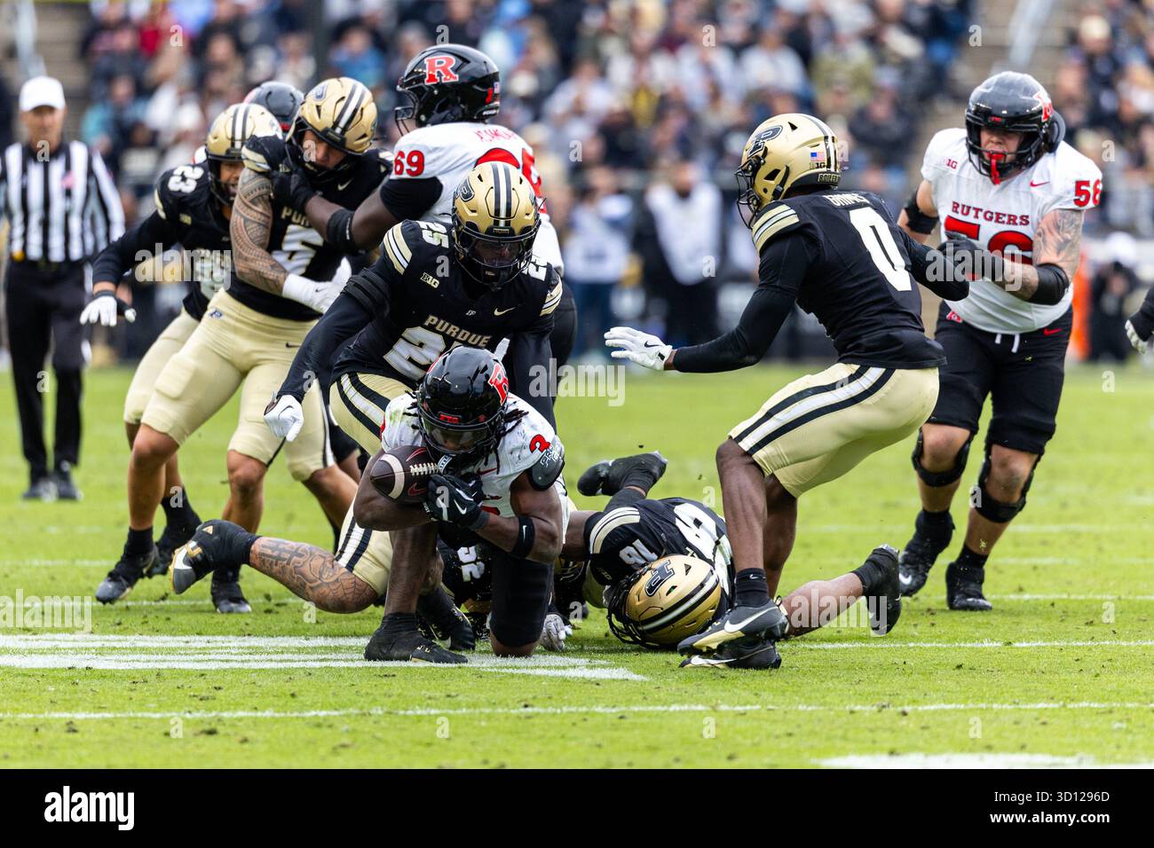 October 25, 2025: Rutgers running back Antwan Raymond (3) fumbles the ...