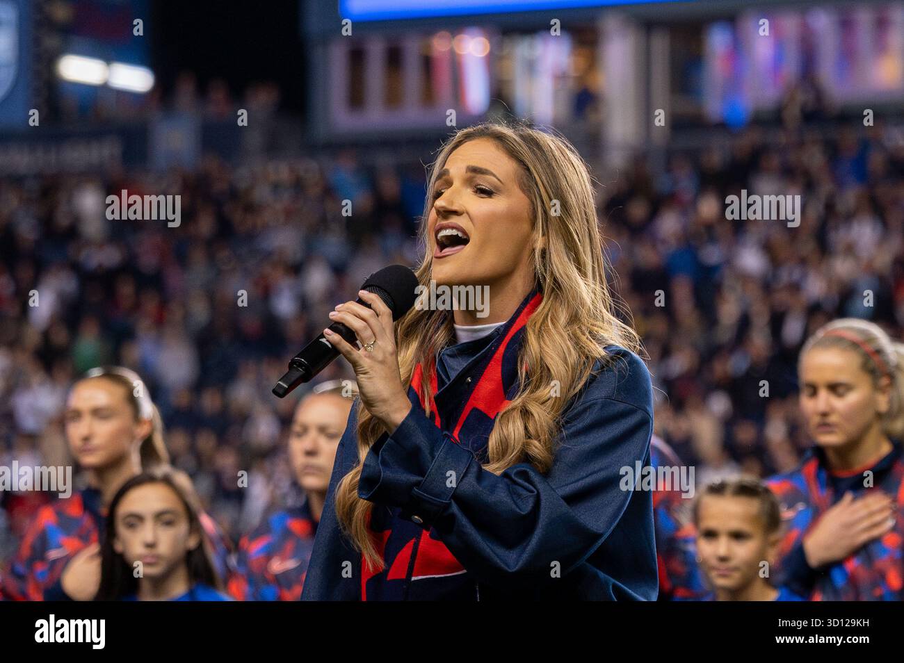 Grace Leer sings the US National Anthem during the football match ...