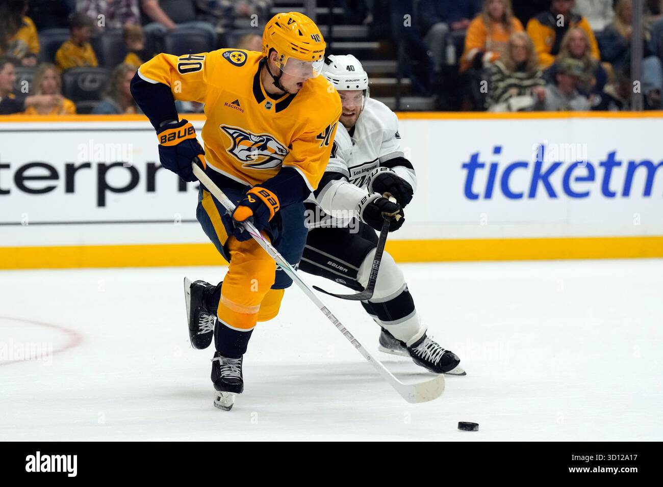 Nashville Predators center Fedor Svechkov, left, and Los Angeles Kings ...