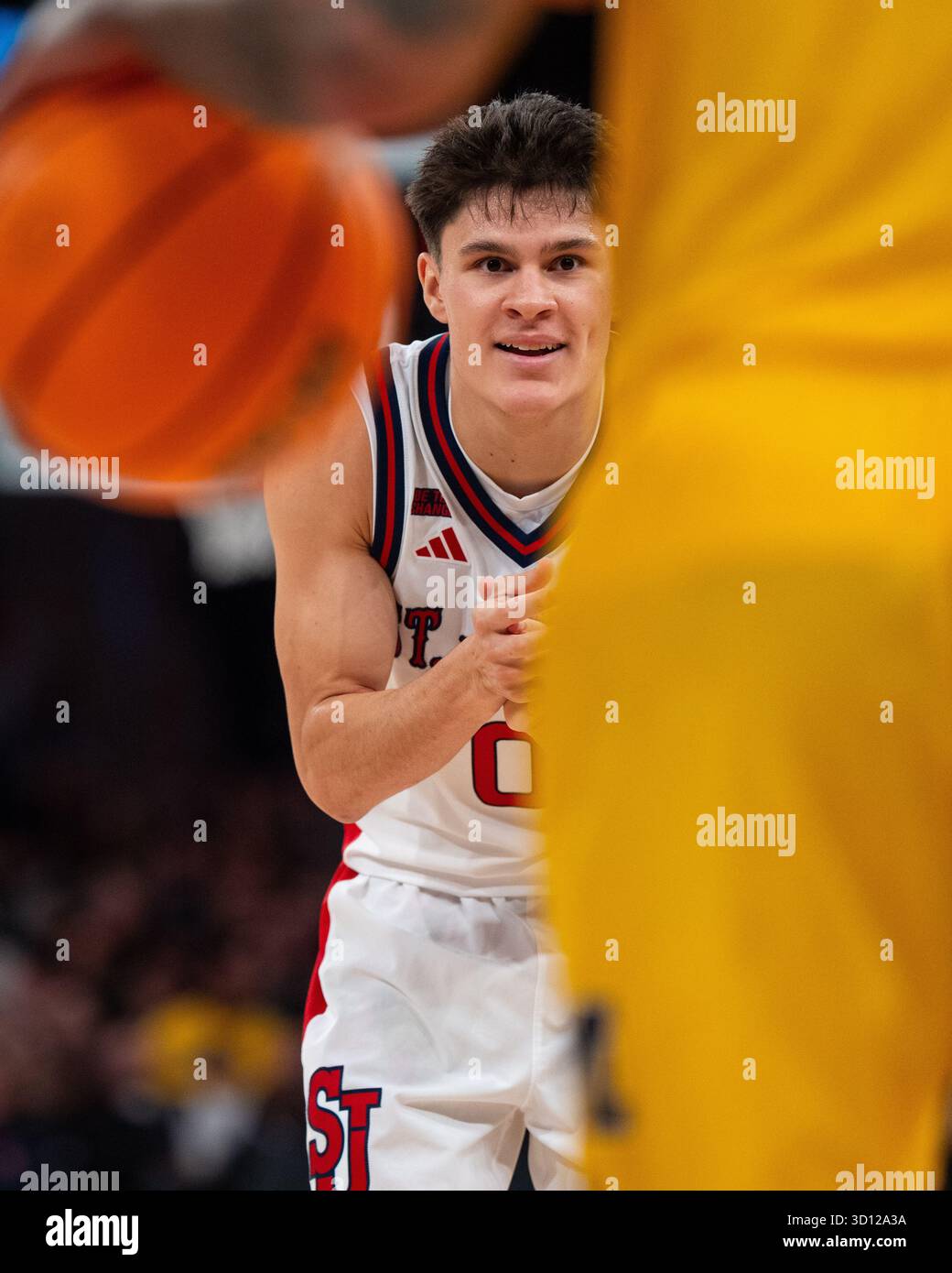 St. John guard Dylan Darling claps while defending against Michigan ...