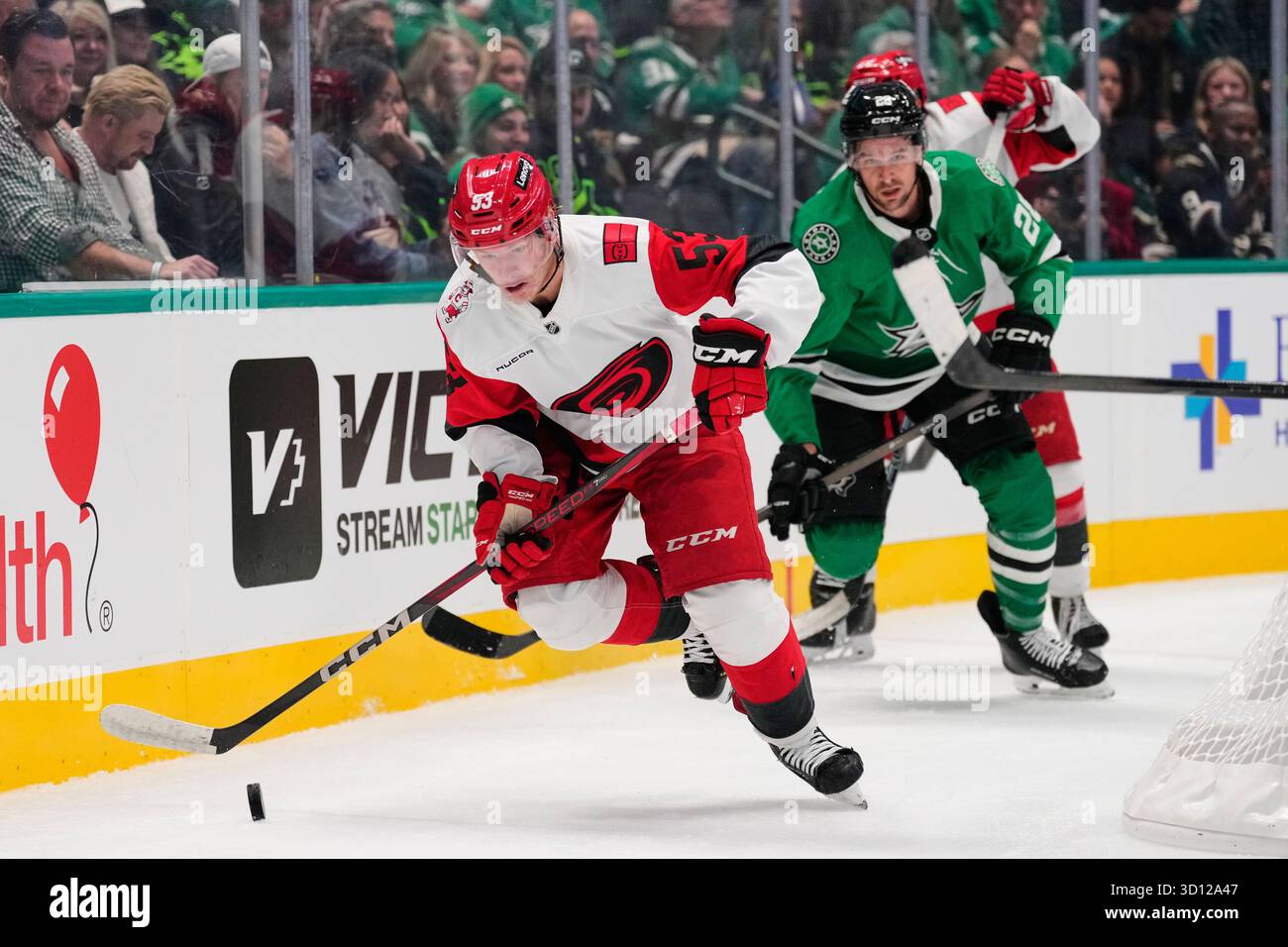 Carolina Hurricanes' Jackson Blake controls the puck as Dallas Stars ...