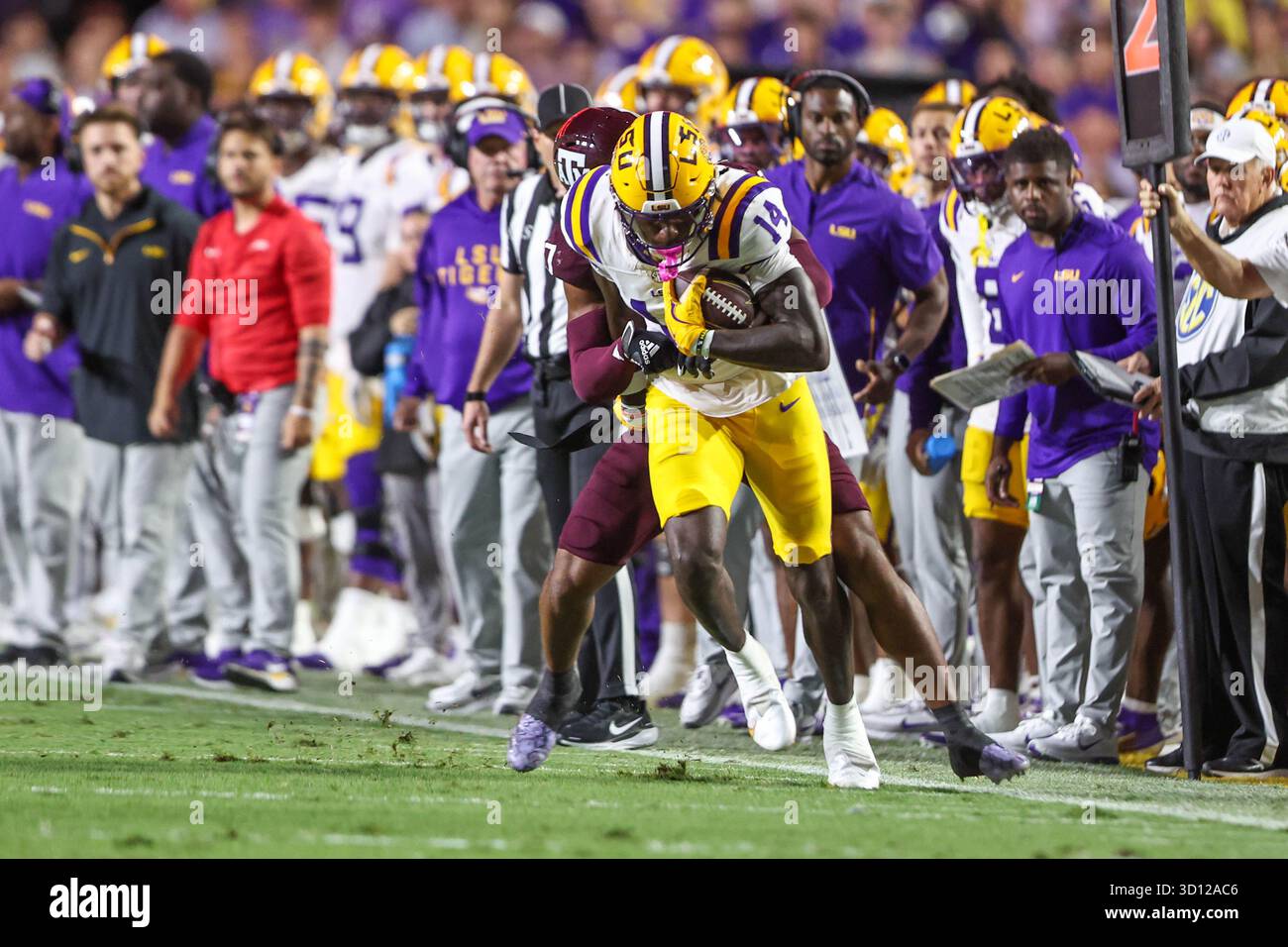 Baton Rouge, LA, USA. 25th Oct, 2025. LSU's Trey'Dez Green (14) fights ...