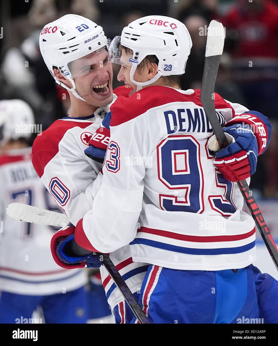 Montreal Canadiens' Juraj Slafkovsky (20) and Ivan Demidov (93 ...