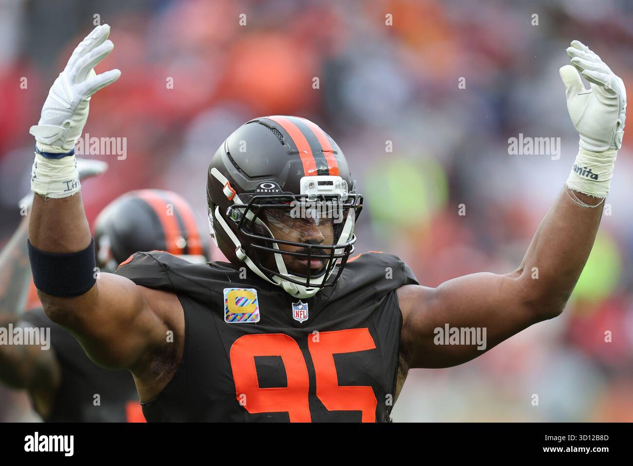 Cleveland Browns defensive end Myles Garrett (95) calls for crowd ...