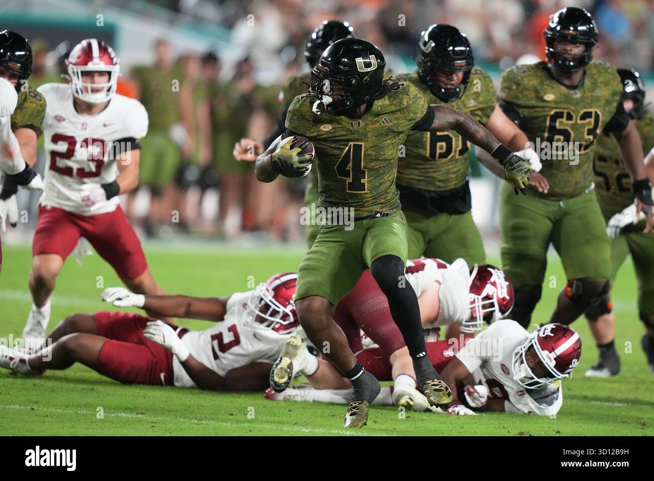 Miami running back Mark Fletcher Jr. (4) runs during the second half of ...