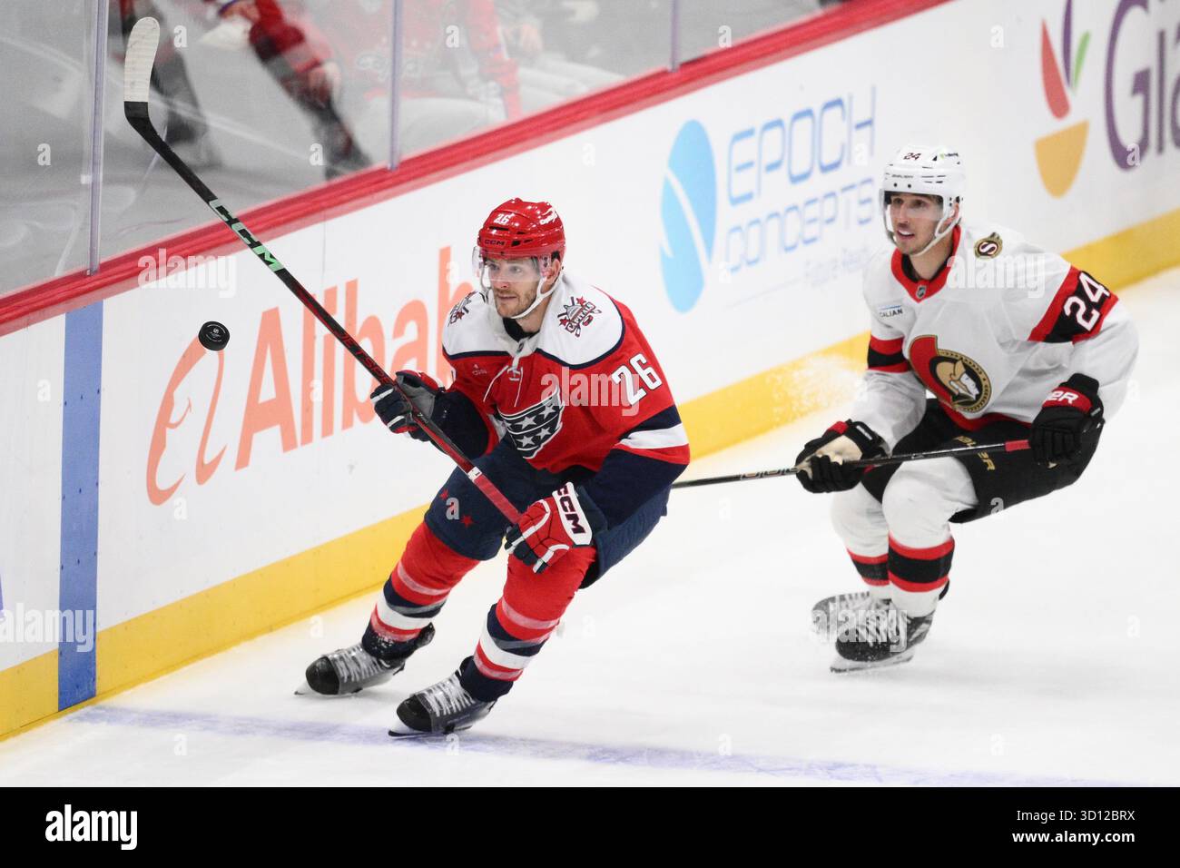 Washington Capitals center Nic Dowd (26) and Ottawa Senators center ...