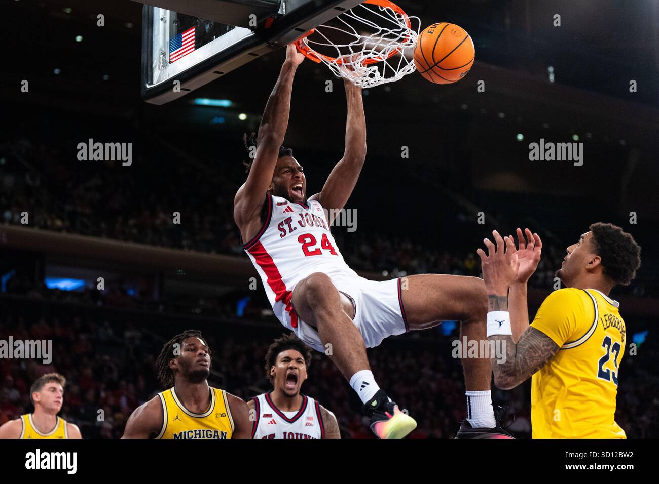St. John forward Zuby Ejiofor (24) dunks during the second half of an ...