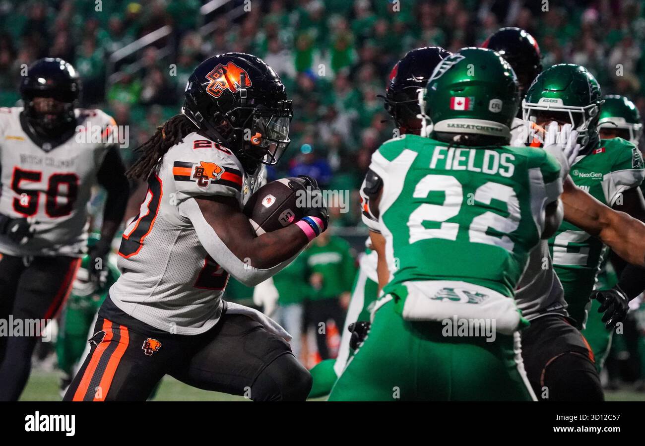 B.C. Lions running back James Butler (20) runs the football against the ...