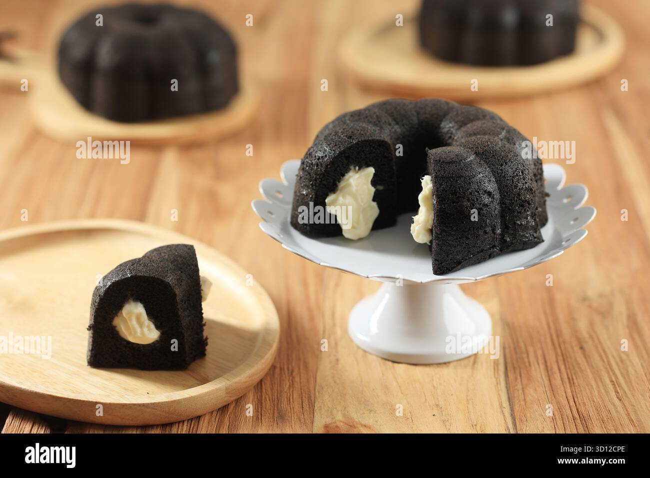 Mini Black Sticky Rice Bundt Cake With Melted Cheese Filling Known as ...