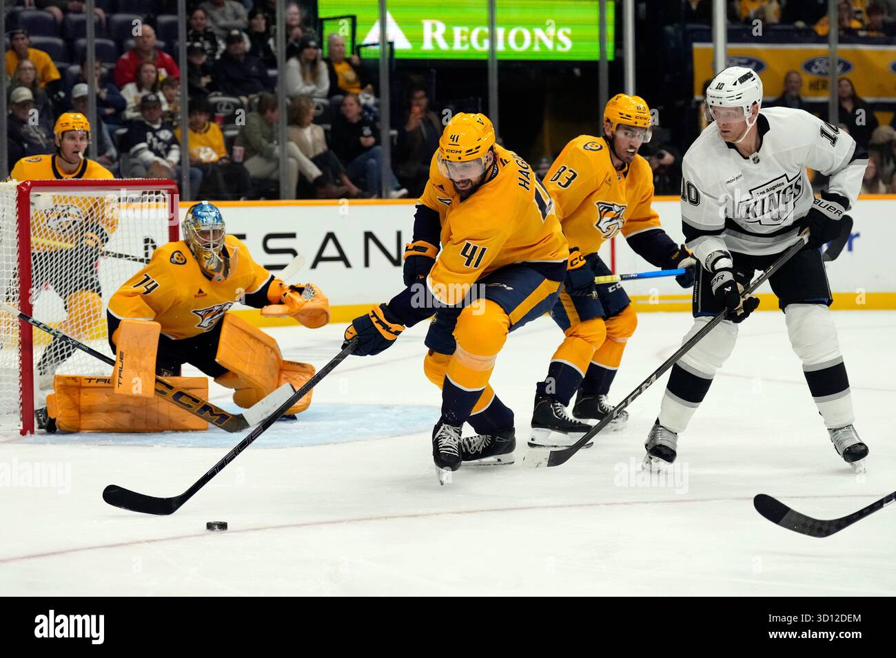 Nashville Predators defenseman Nicolas Hague (41) reaches the puck ...