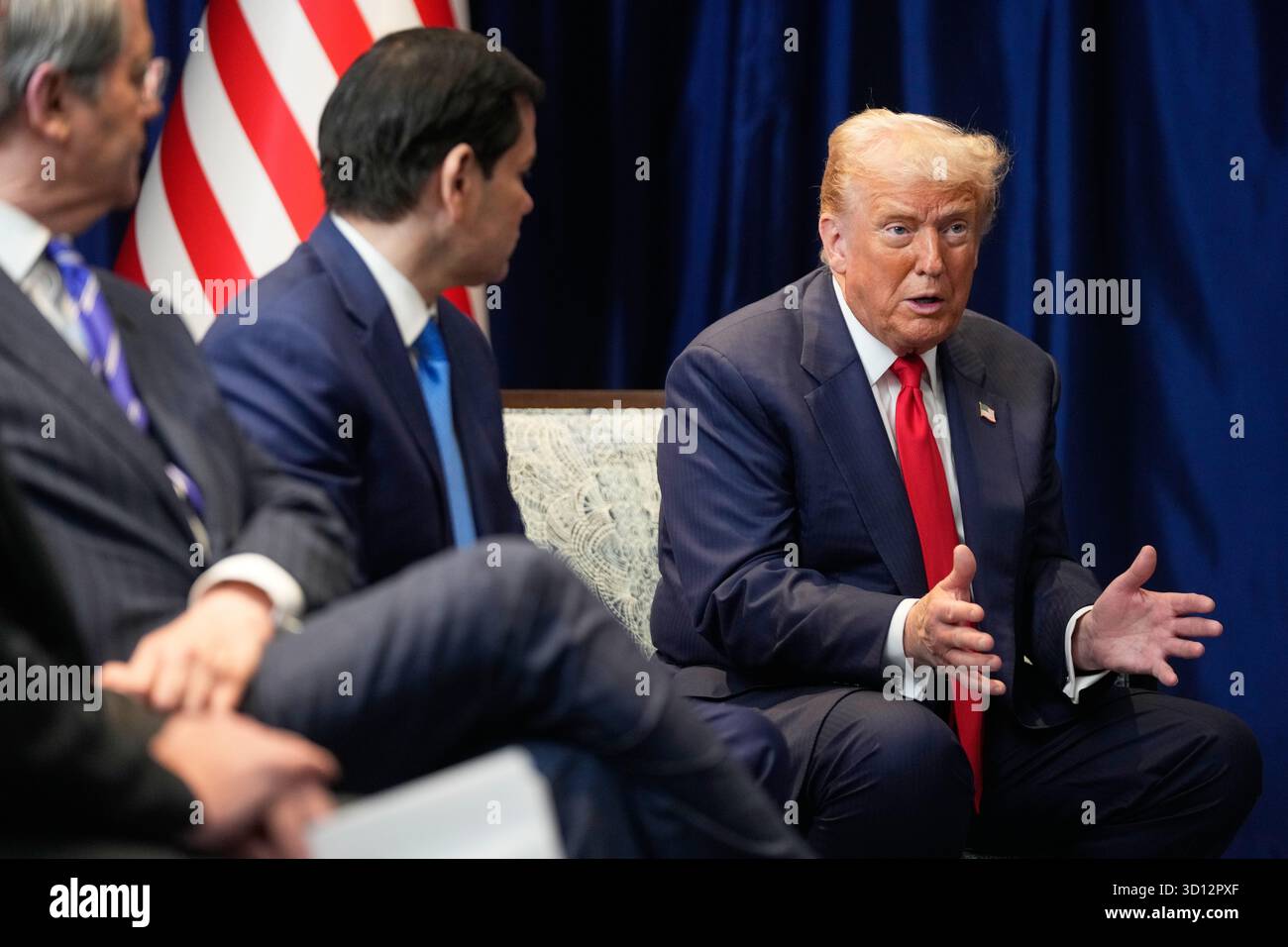 President Donald Trump gestures during a meeting with Brazil's ...