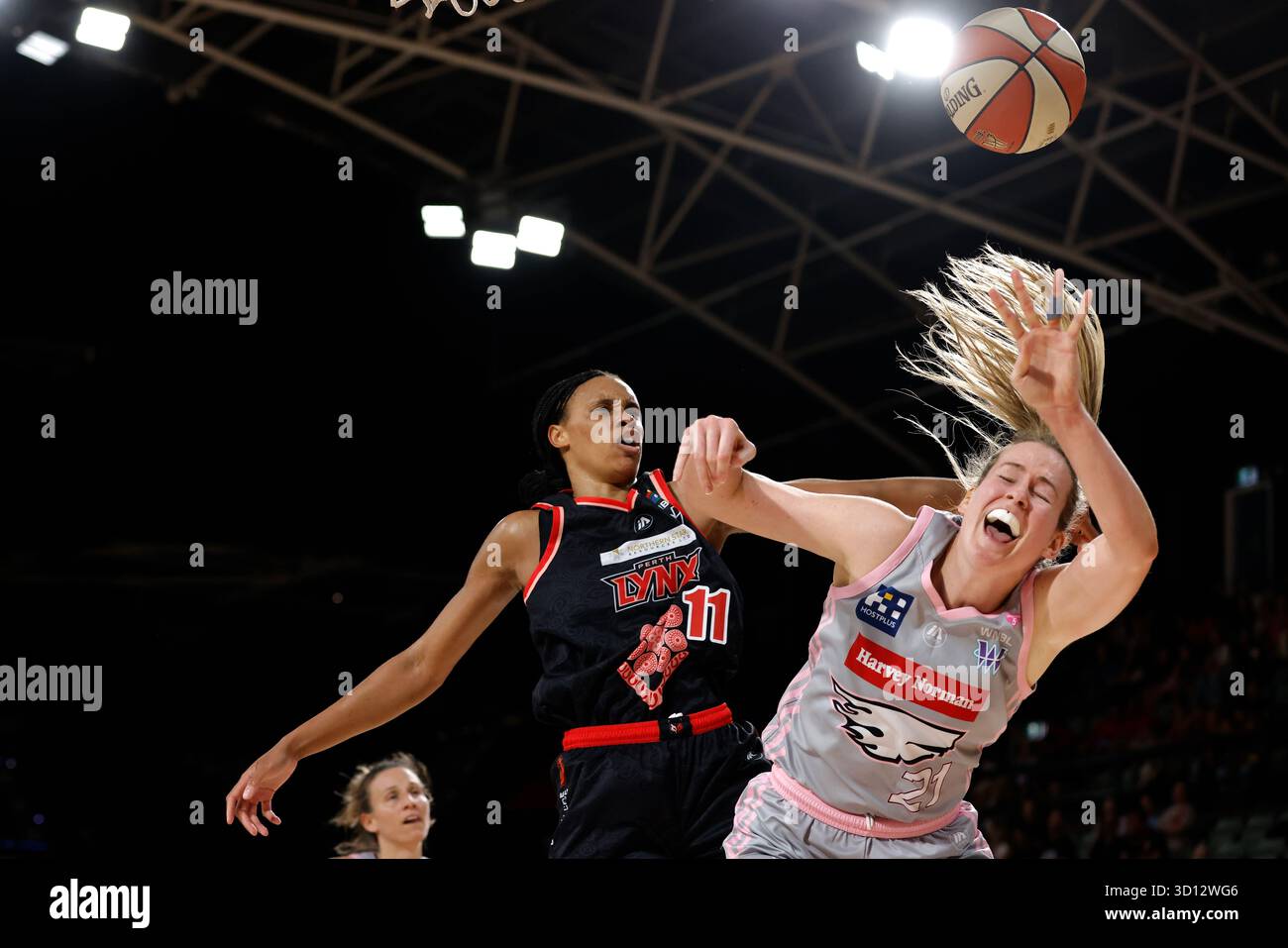 Keely Froling of the Flames and Brianna Turner of the Lynx in action ...