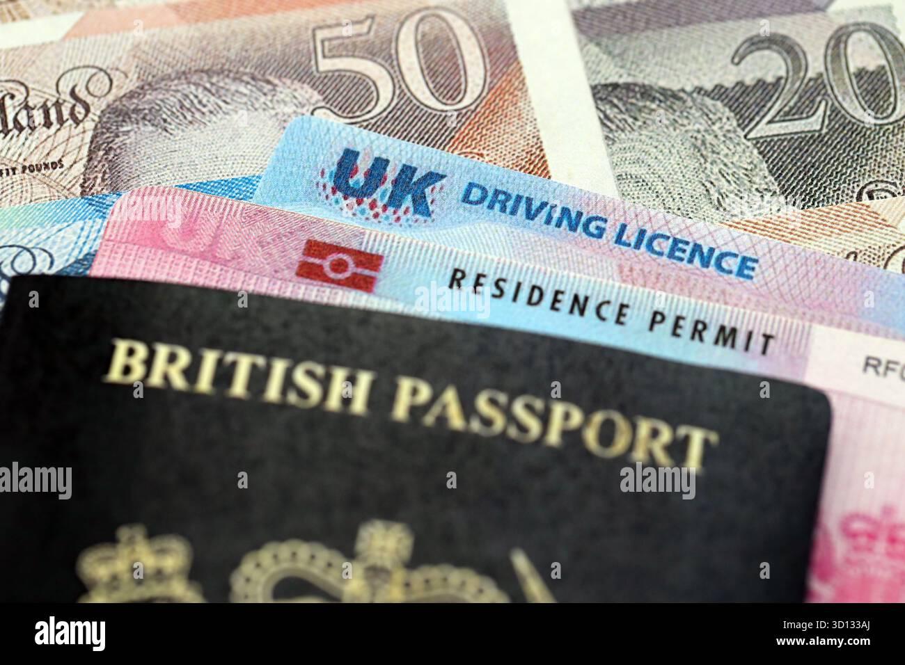 United Kingdom driving license with passport and residence permit card ...