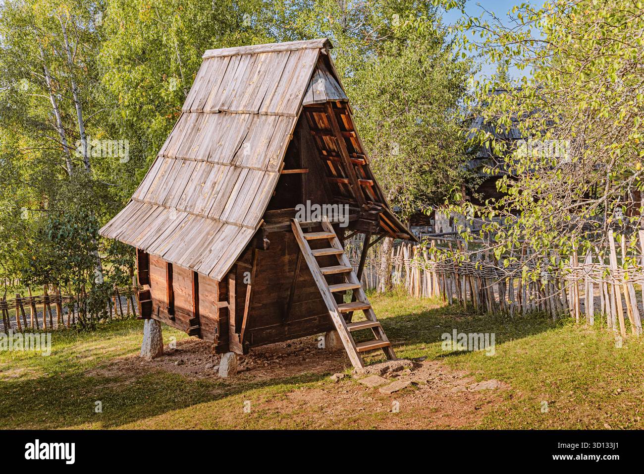 Old wooden granary building on stone stilts, showcasing traditional ...