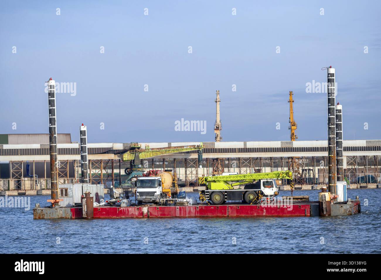Floating platform with crane for hydrotechnical works and concrete ...