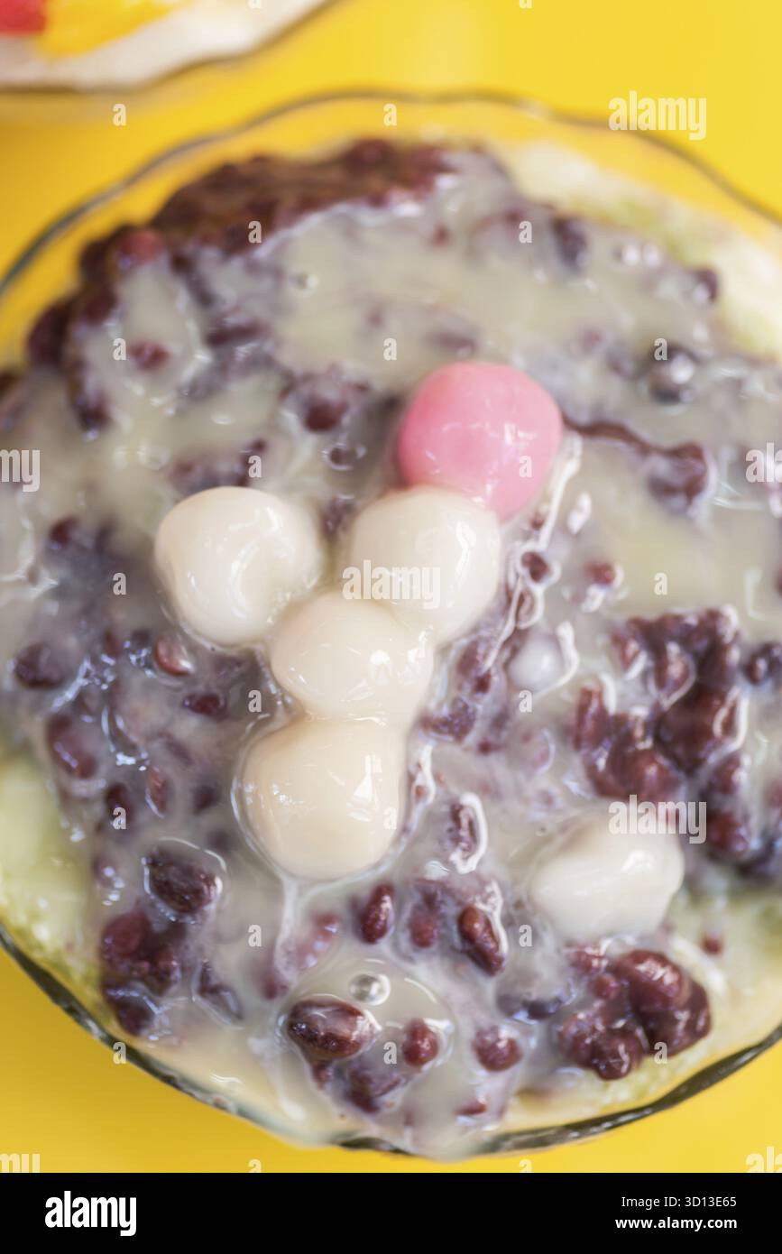 Eating red bean shaved ice in the restaurant Stock Photo - Alamy