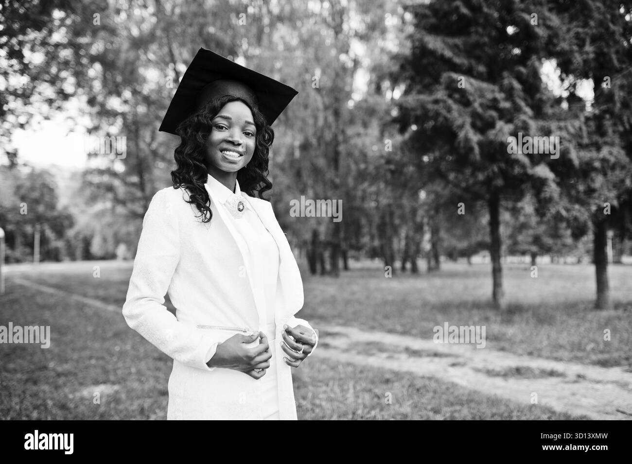 Happy beautiful black african american girl with hat graduates Stock ...