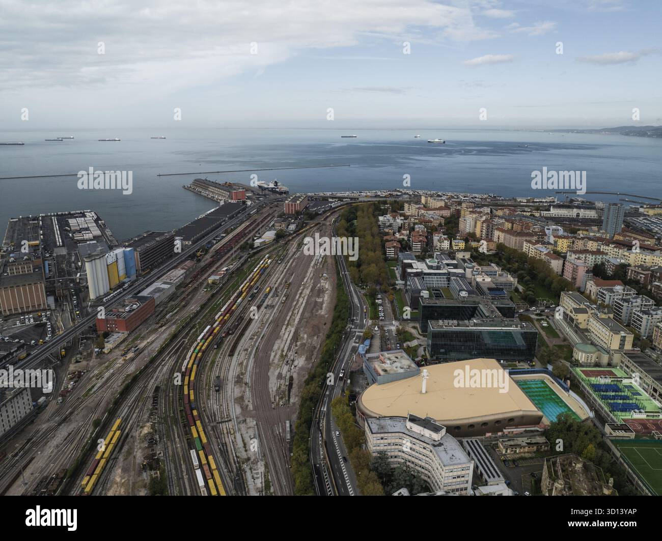Aerial view of the industrial port and railway lines stretching towards ...