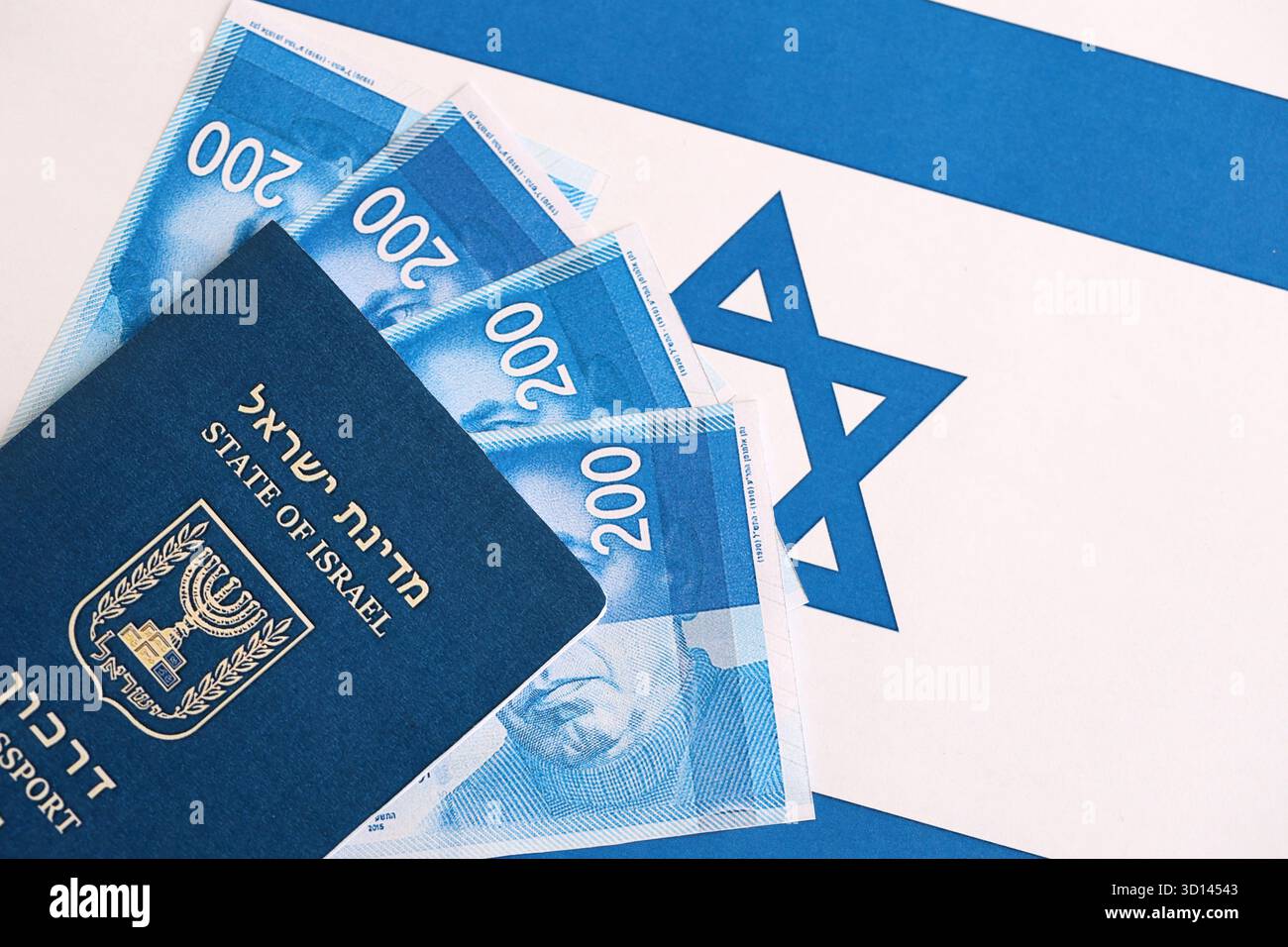 Israel New Shekels banknotes and passport on flag. The current Israel ...