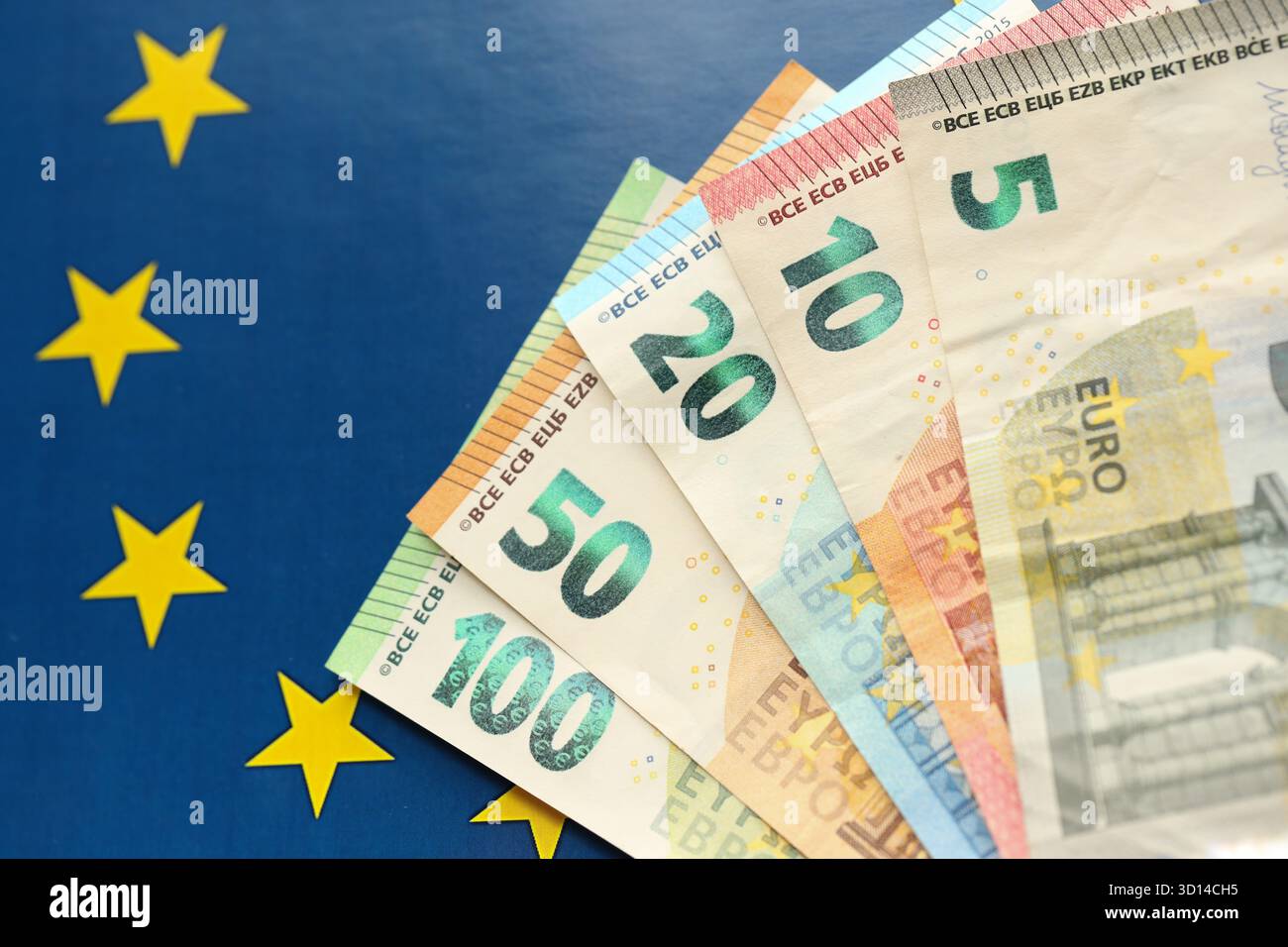 European union money currency Euro different paper notes on flag close ...