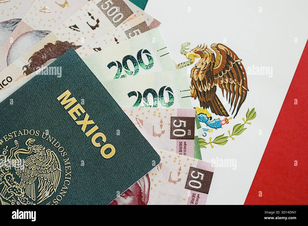 Mexican pesos money bills in big amount and passport lies on Mexico ...