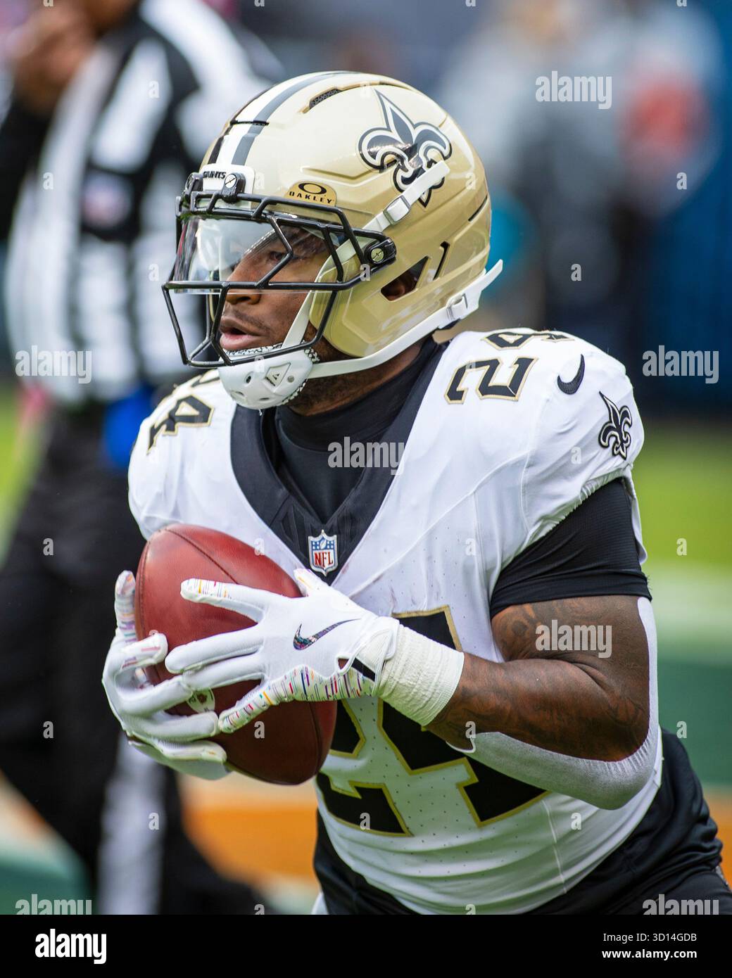 October 19, 2025: New Orleans Saints Devin Neal (24) runs with the ball ...