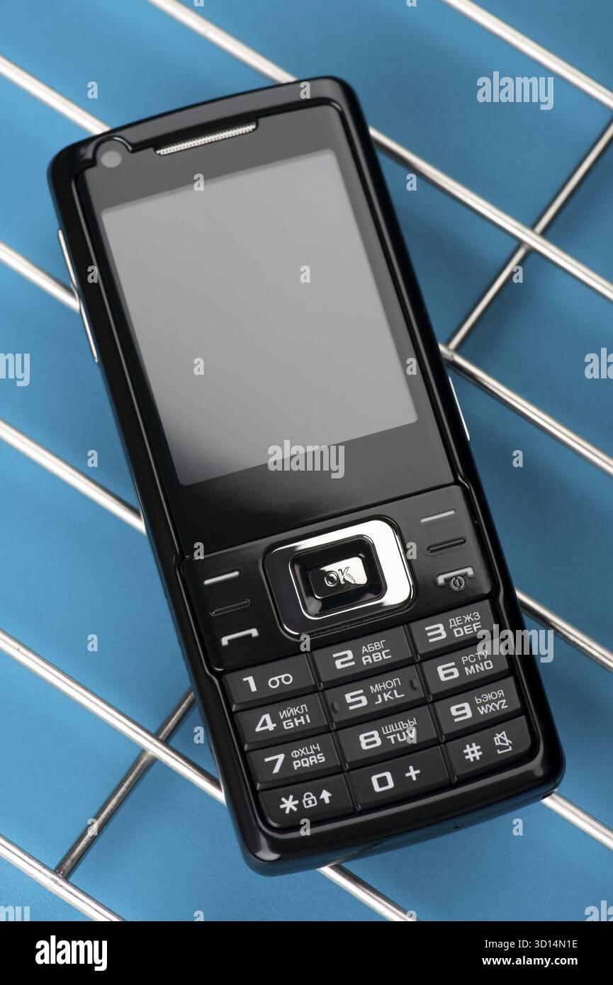 Object on blue mobile hi-res stock photography and images - Alamy