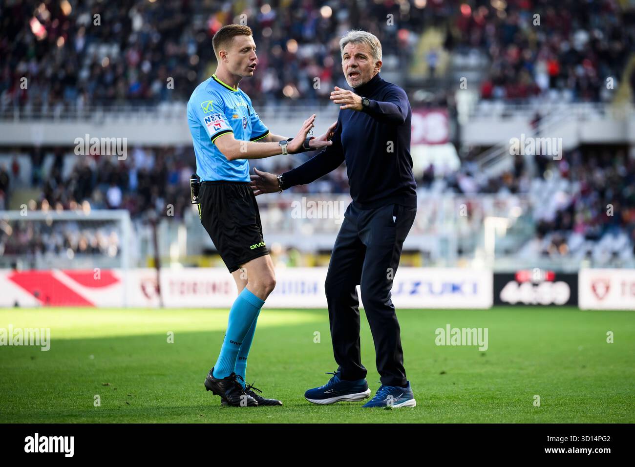 Marco Baroni, head coach of Torino FC, speaks with referee Kevin ...