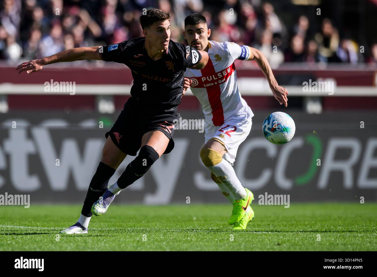 Cesare Casadei of Torino FC competes for the ball with Johan Vasquez of ...