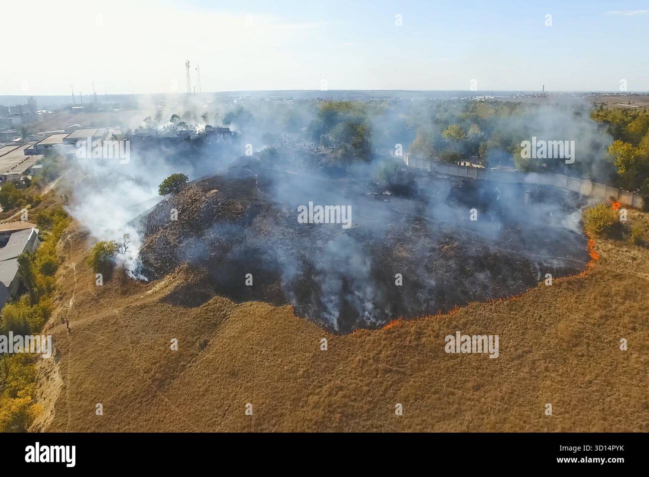Steppe fire. Burning dry grass, fire and smoke Stock Photo - Alamy