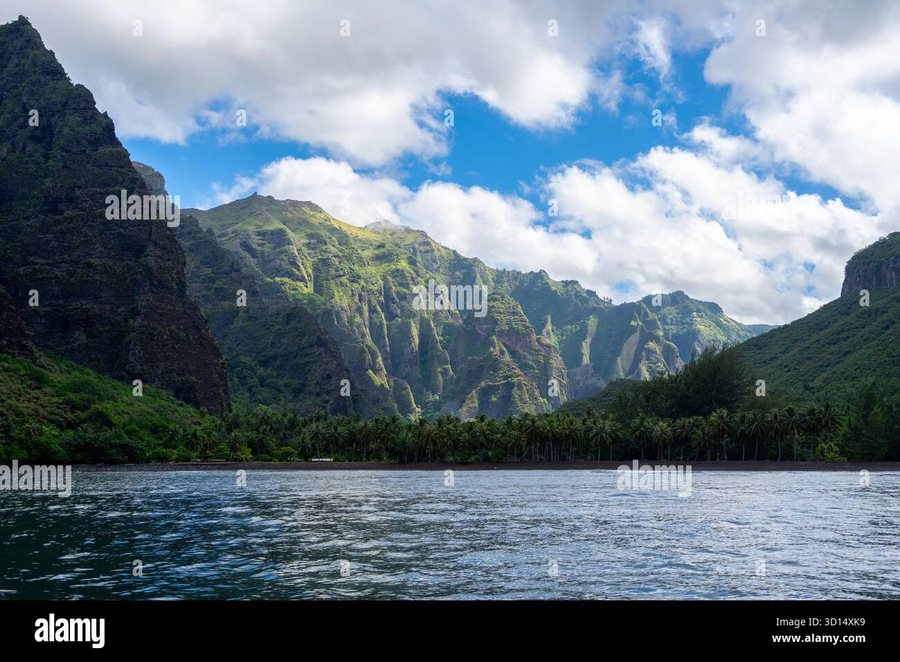 Towering green cliffs dominate Hakaui Bay, Nuku Hiva, Marquesas Islands ...