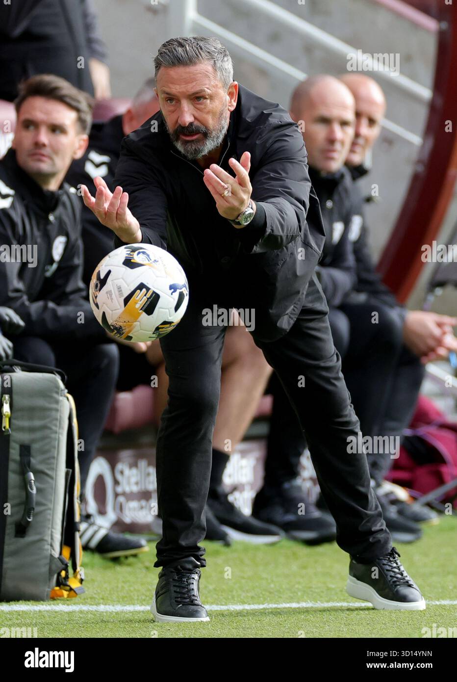Heart of Midlothian manager Derek McInnes throws a ball during the ...