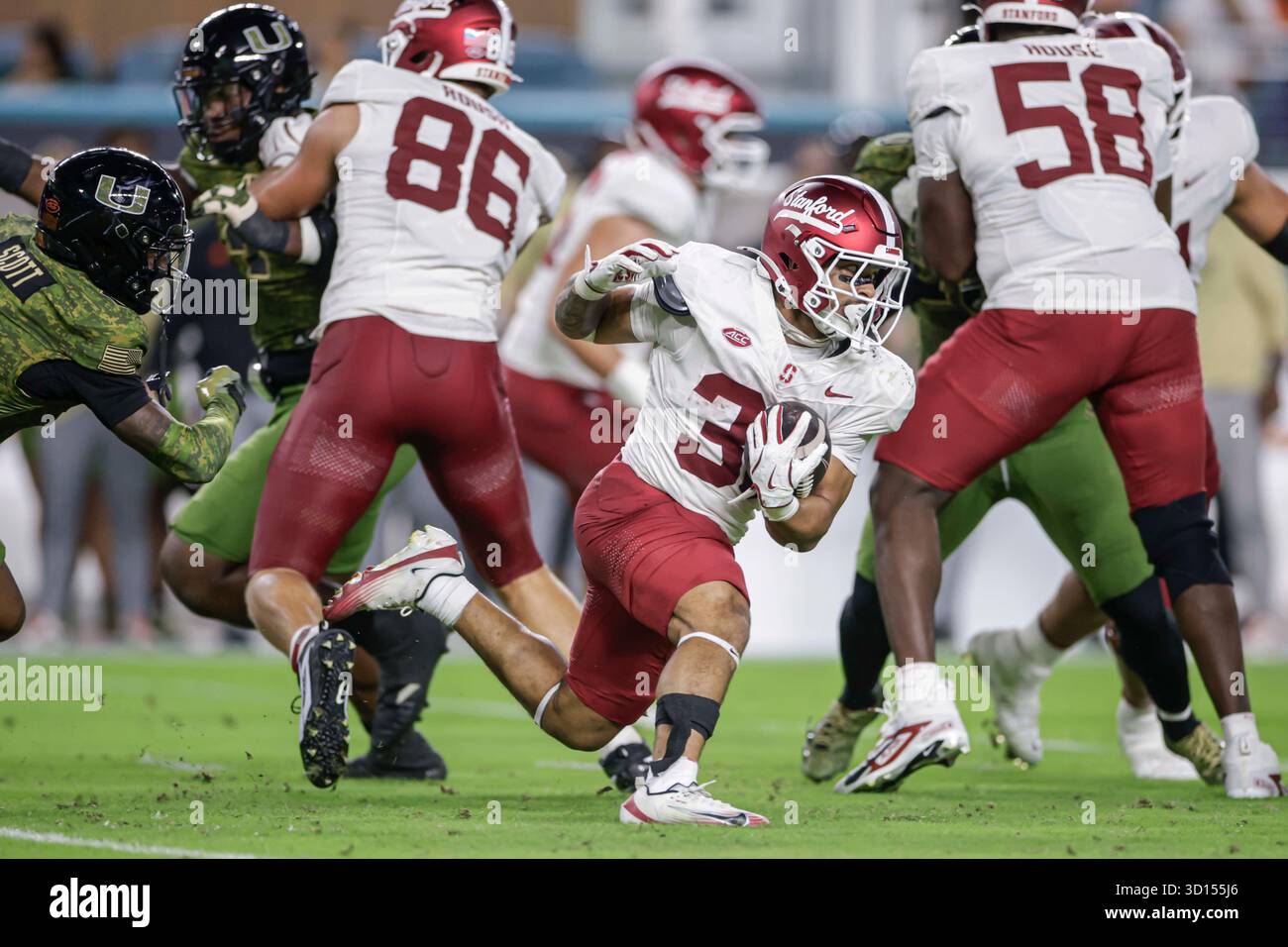 Miami, FL: Stanford Cardinal running back Cole Tabb (33) runs with the ...