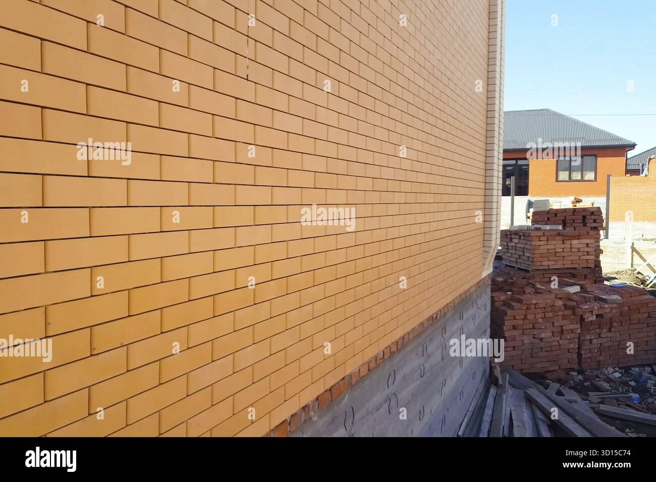 The house is made of yellow silicate brick. The walls and facade of the ...