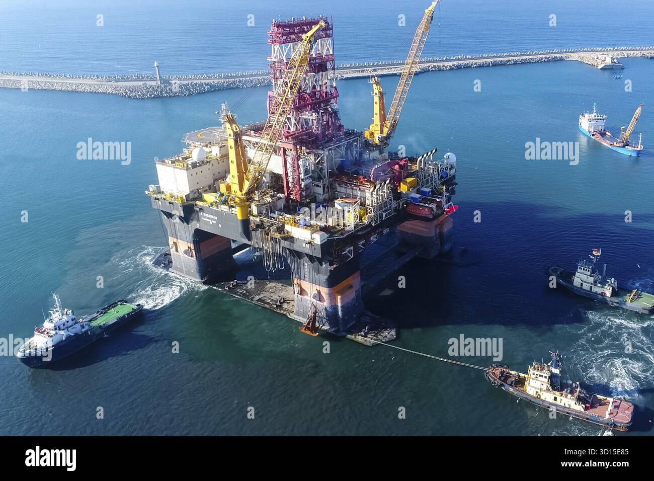 Drilling platform in the port. Towing of the oil platform Stock Photo ...