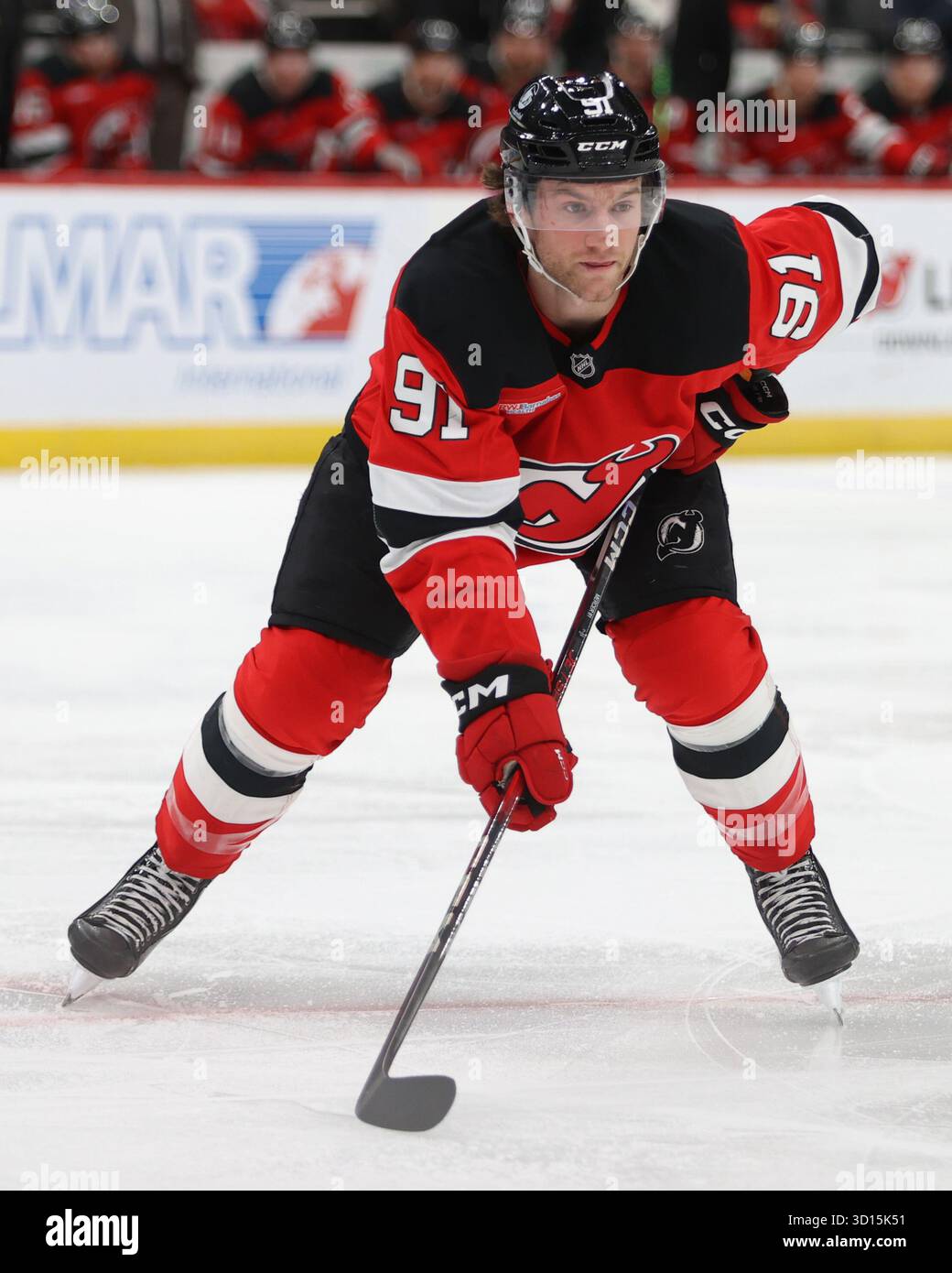 New Jersey Devils' Dawson Mercer stands on the ice during the second ...