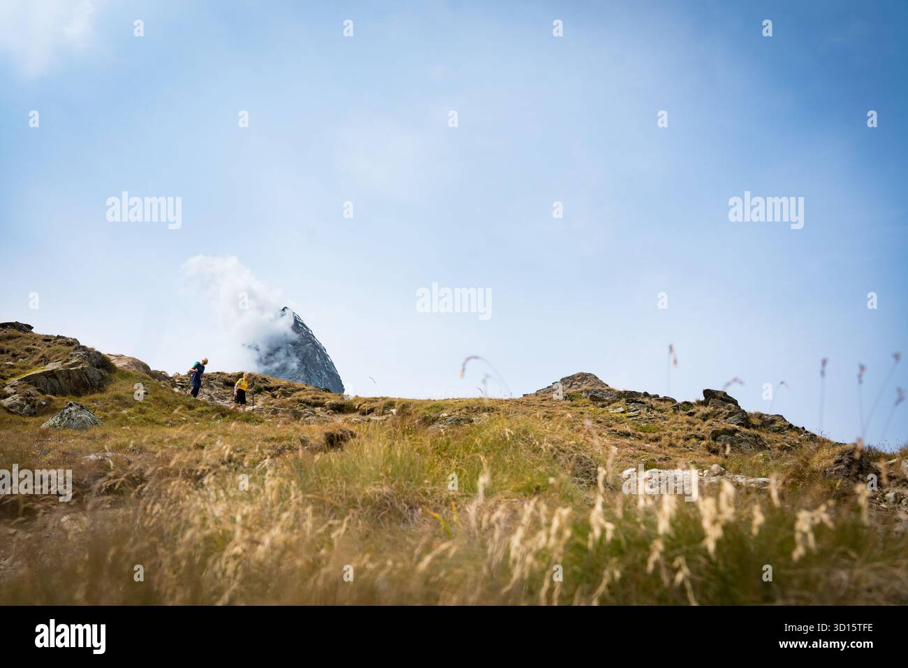 Zermatt, Switzerland - August 19 2025 : Hikers and climbers on the ...