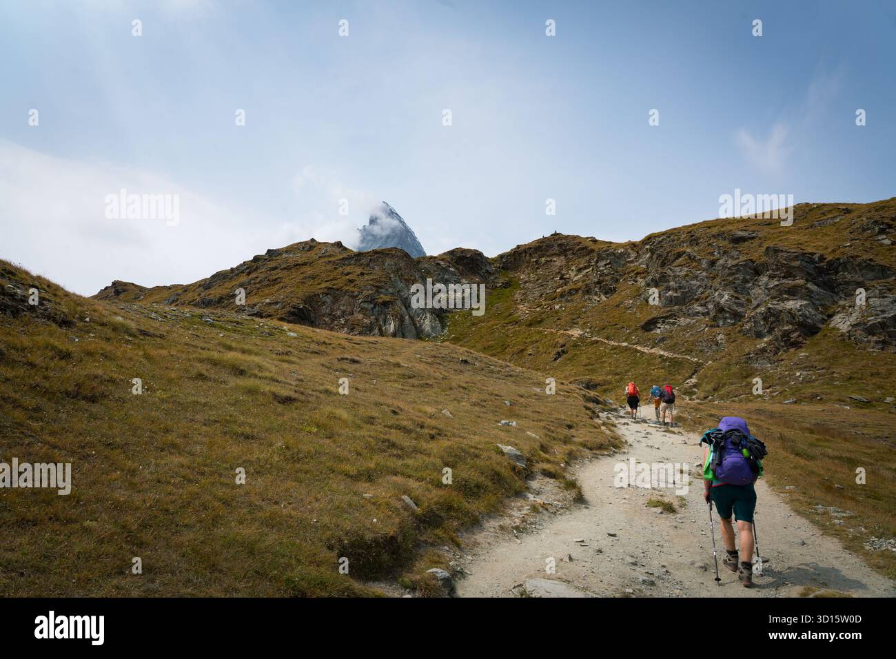 Zermatt, Switzerland - August 19 2025 : Hikers and climbers on the ...