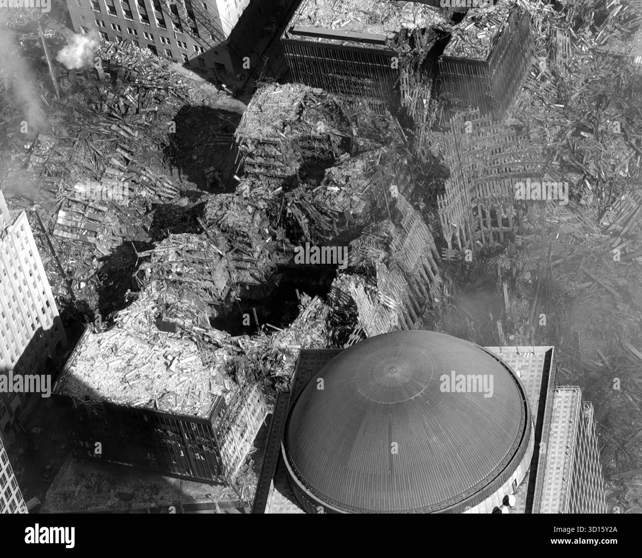 A high-angle view of the area known as “Ground Zero” showing the rubble ...