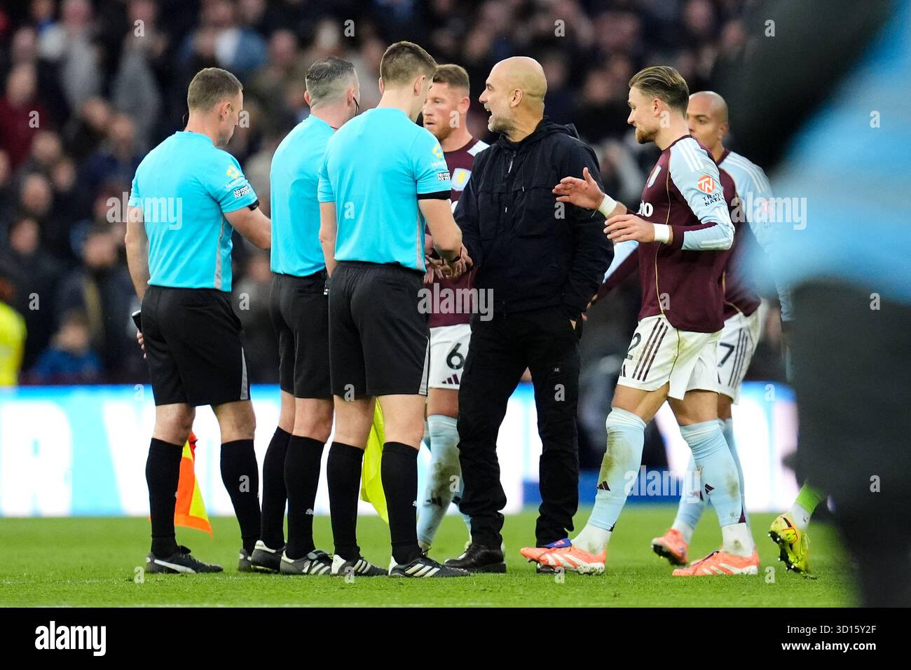 Manchester City manager Pep Guardiola speaks with referee Michael ...